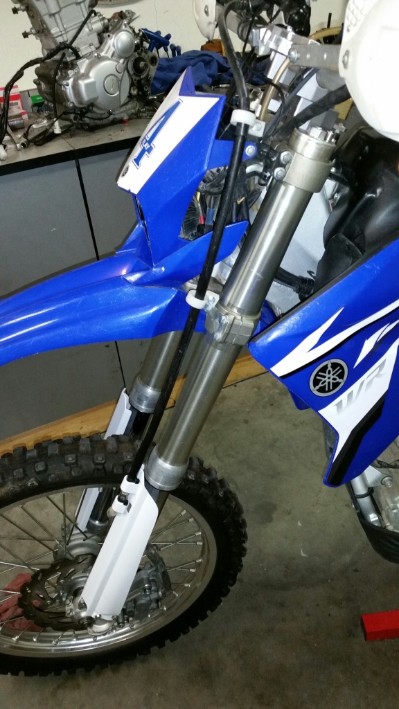 '03 YZ450F forks on a WR250R is this possible?