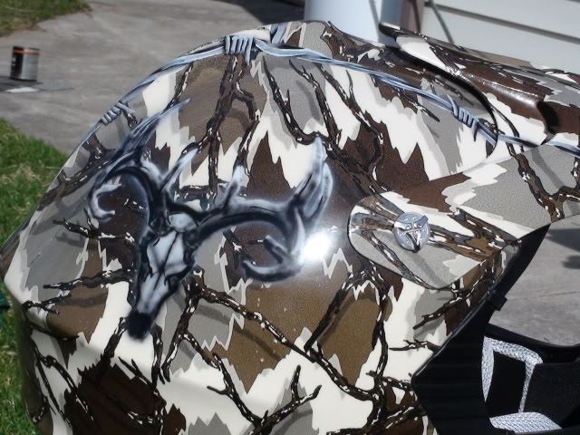 My custom camo-dipped, airbrushed ATV helmet