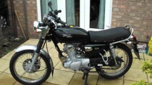 Projet scrambler sym 125 wolf classic